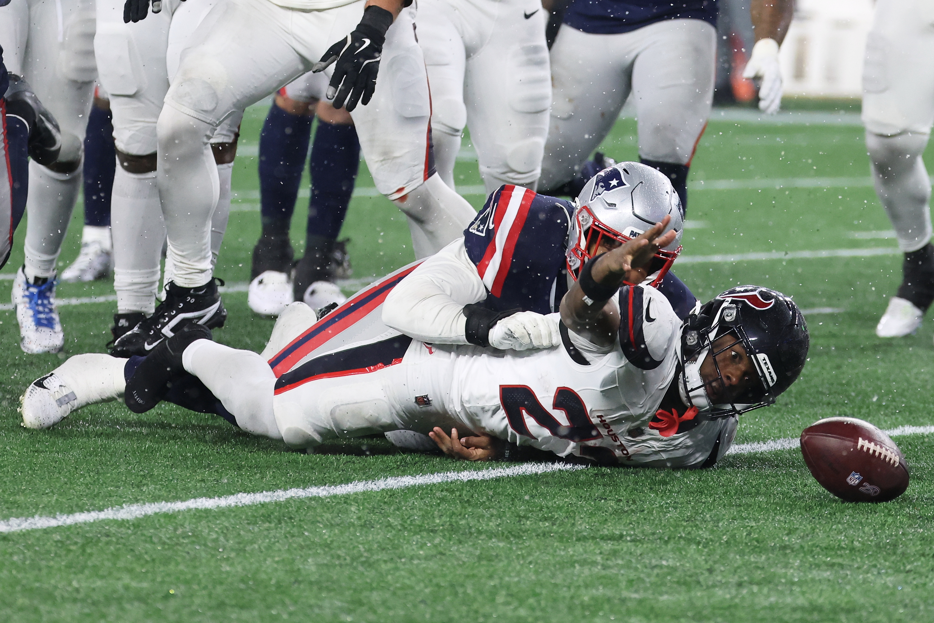Patriots emerge from turnover battle to beat Texans; Rams win OT ...
