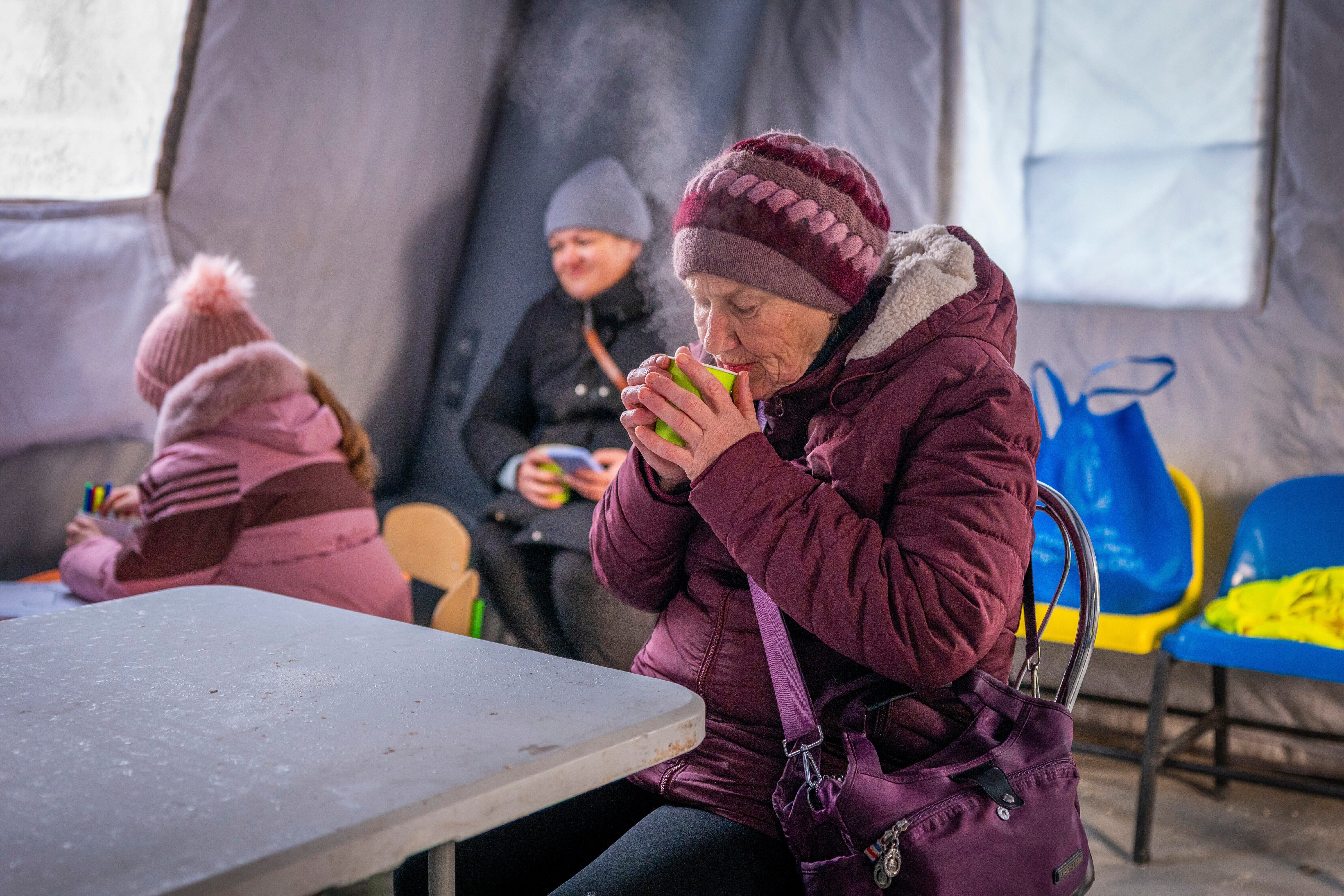 Photos show Ukrainians enduring a frigid winter after Russian strikes ...