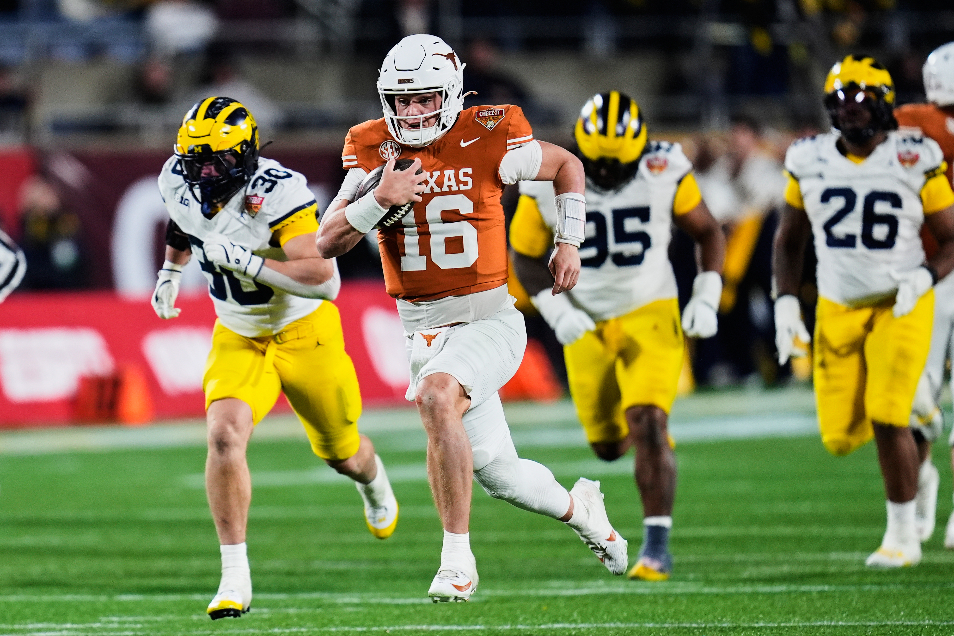 Arch Manning runs and passes Texas past Michigan in Citrus Bowl ...