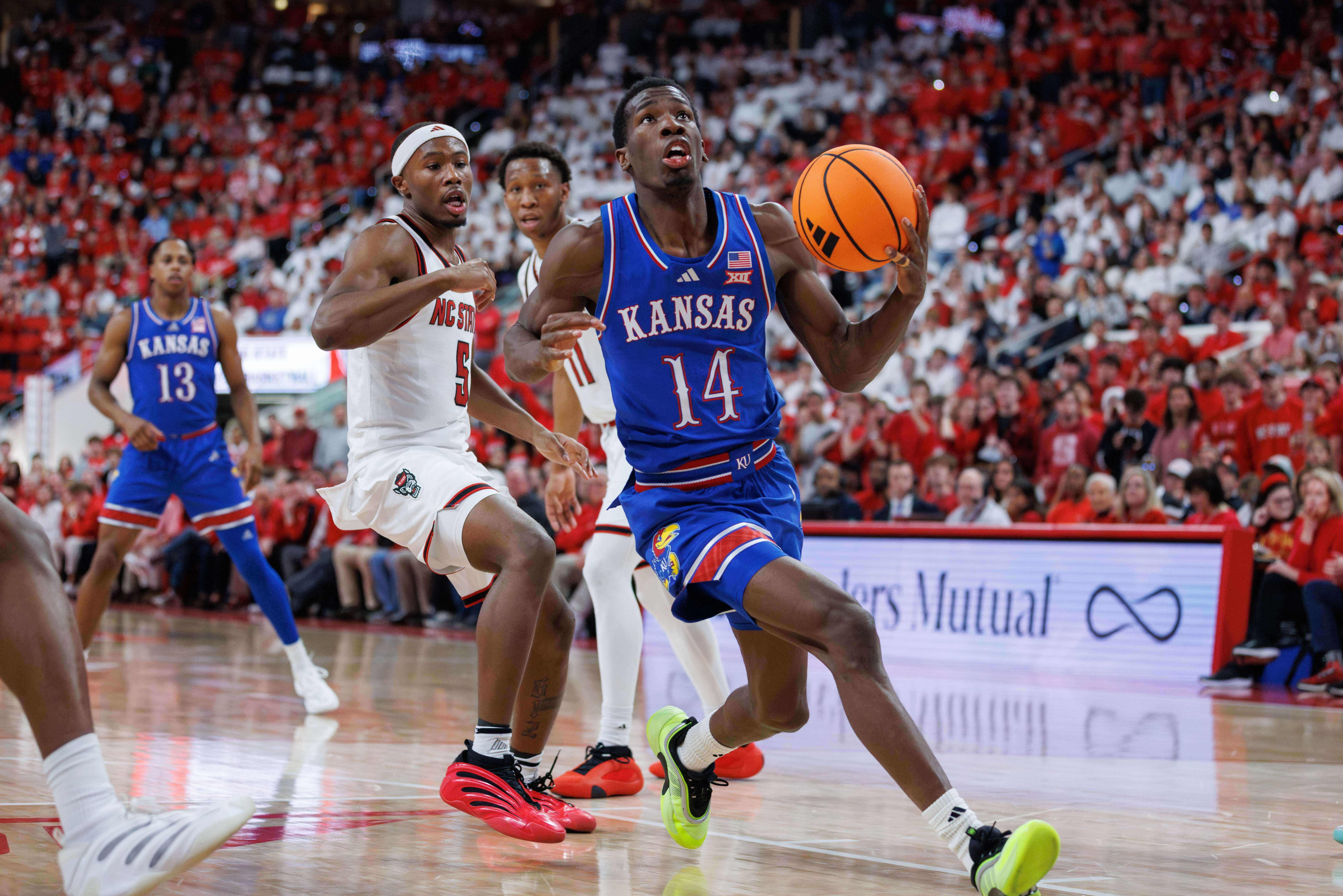 Council's huge day, final-play stop help No. 19 Kansas edge NC State in ...