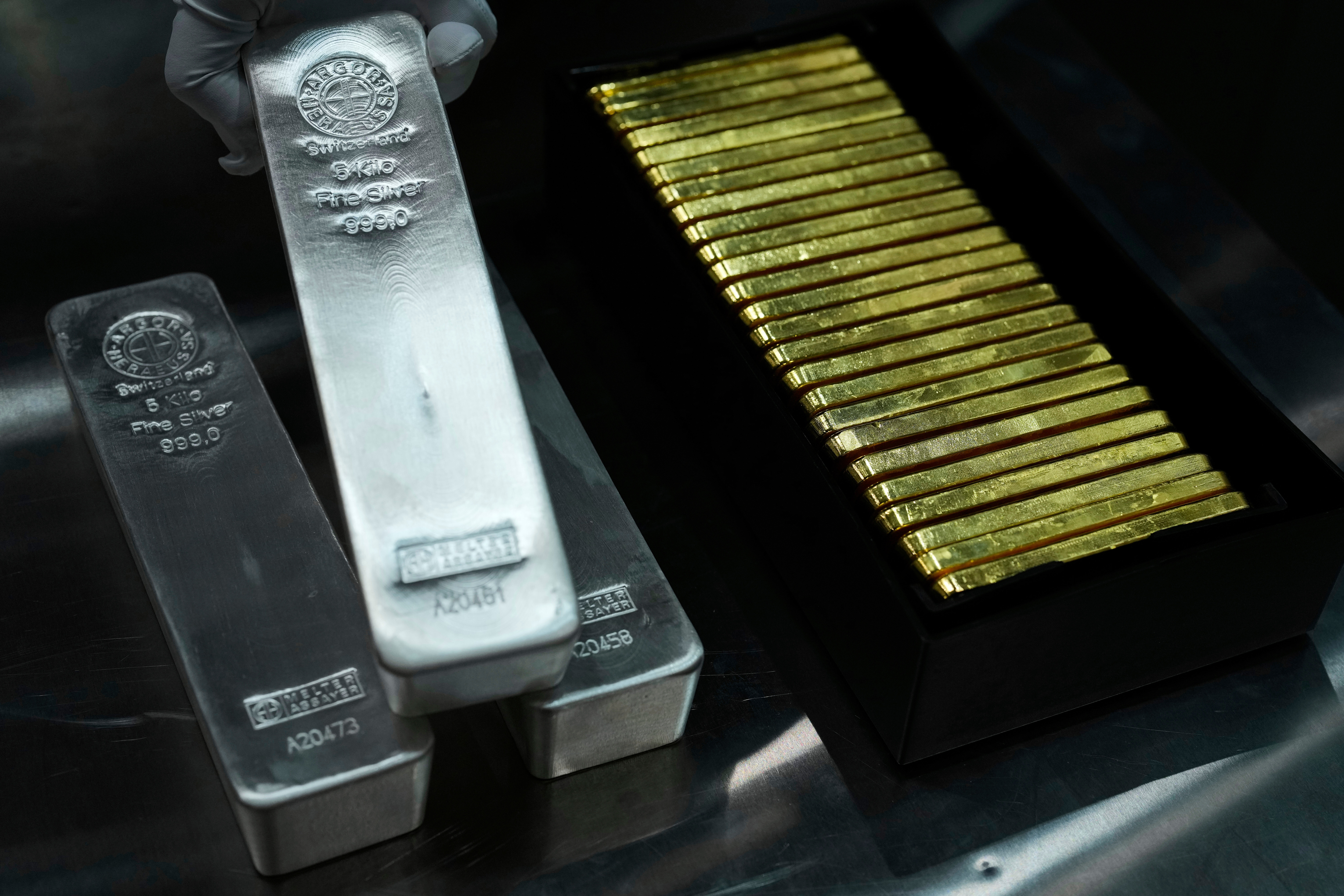 Surging silver and gold slide after CME raises margin requirements ...