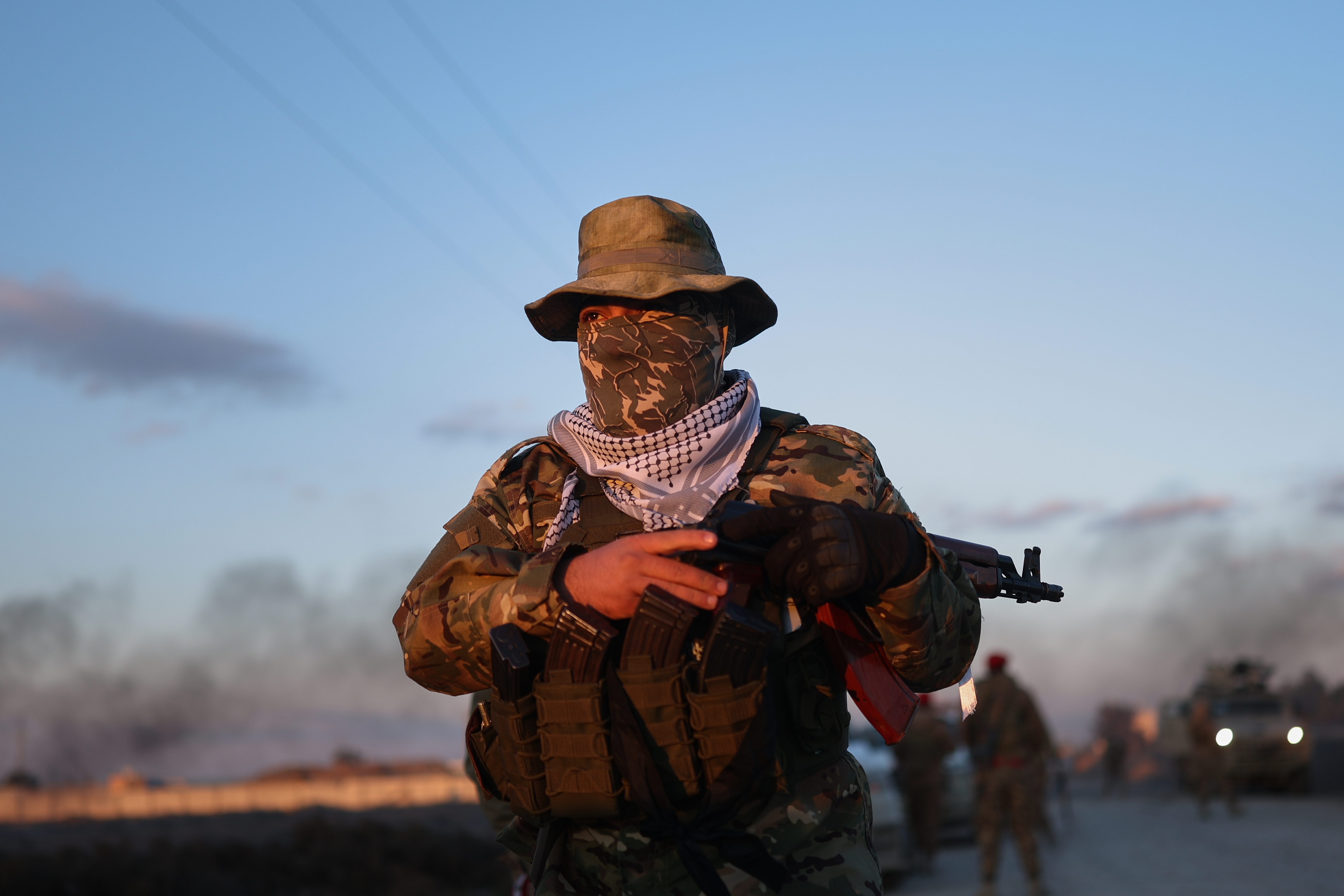 Syrian government forces clash with Kurdish fighters as IS prisoners ...