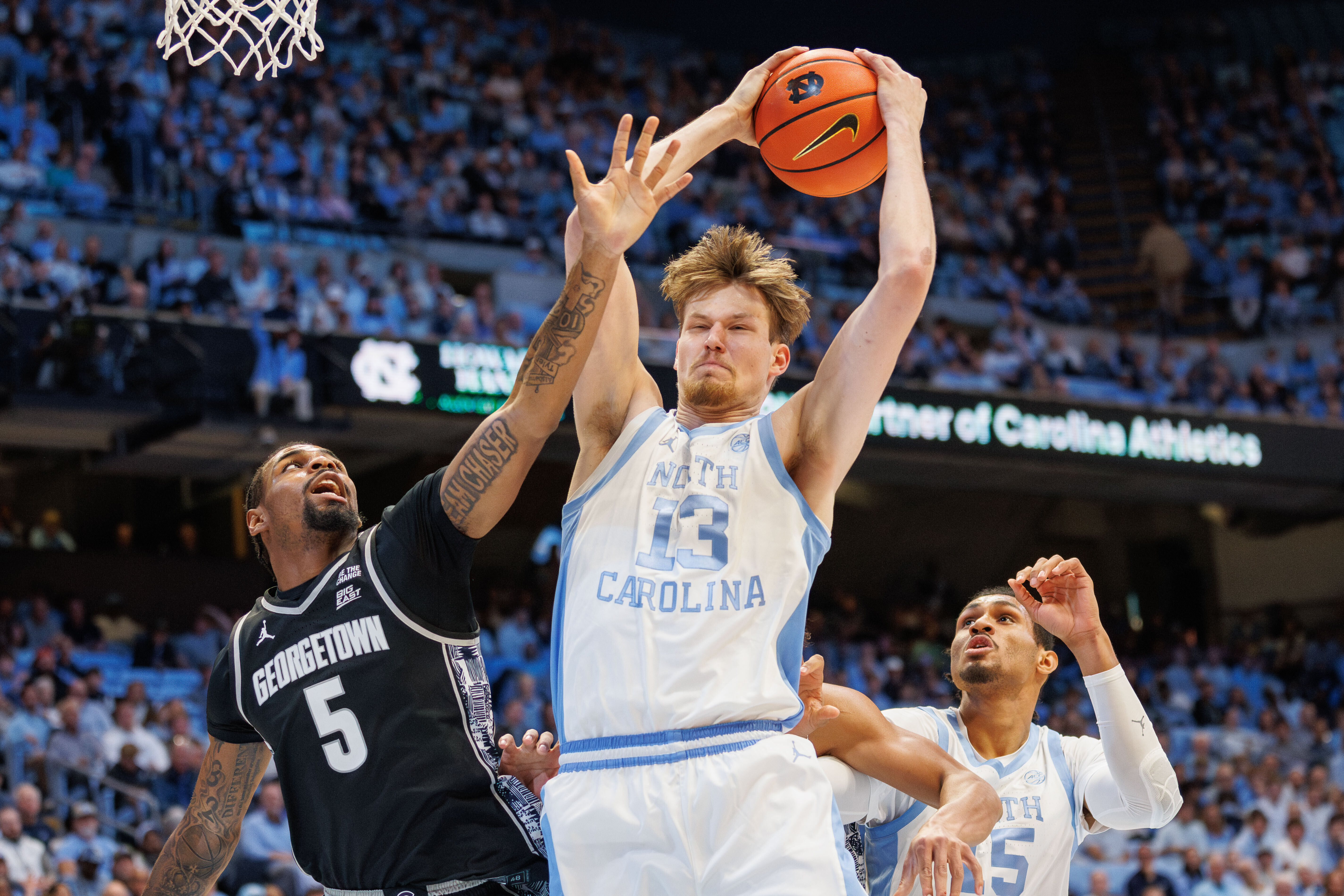 Wilson, Veesar push No. 16 North Carolina past Georgetown, 81-61 ...