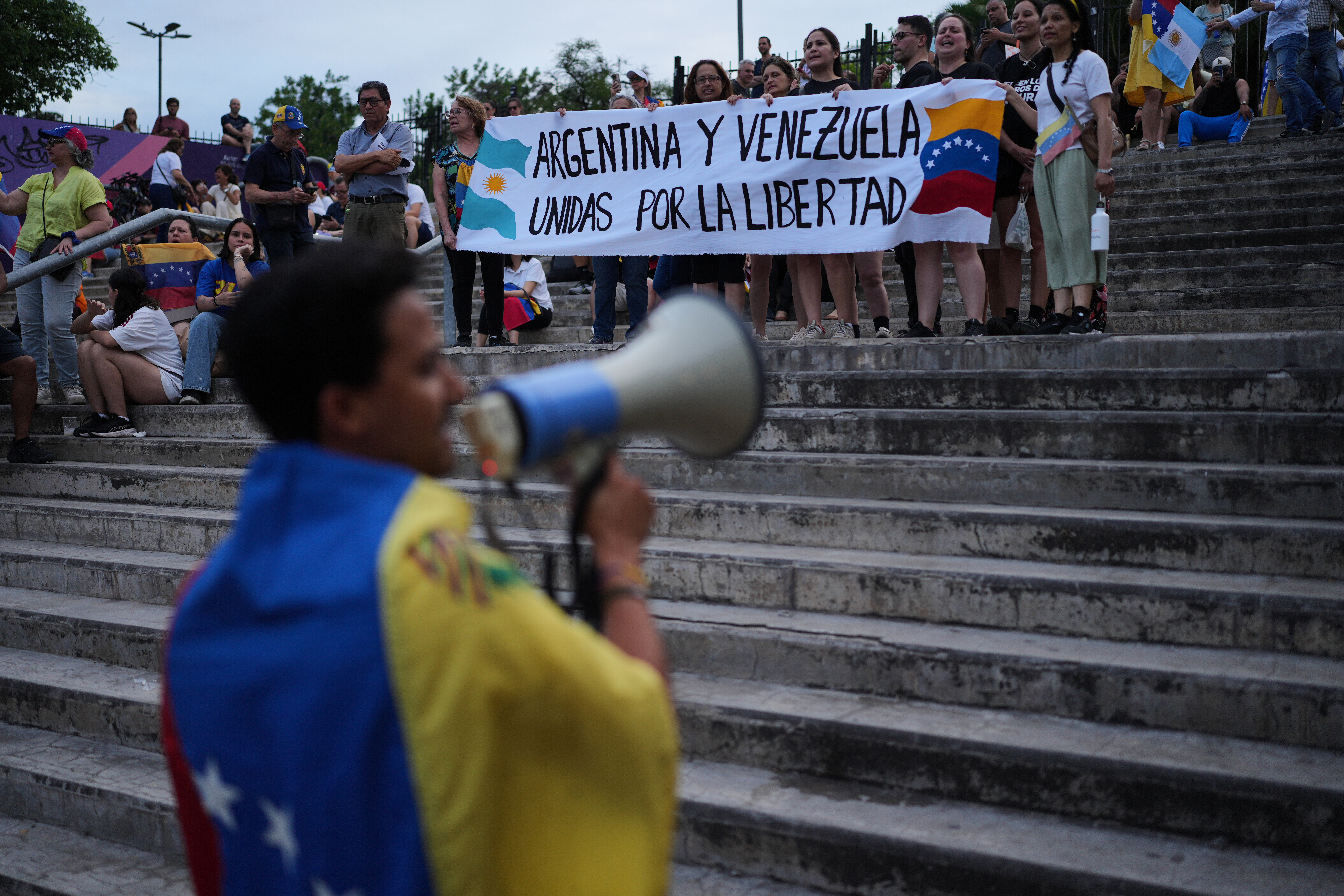 Supporters of Venezuelan opposition leader María Corina Machado march ...
