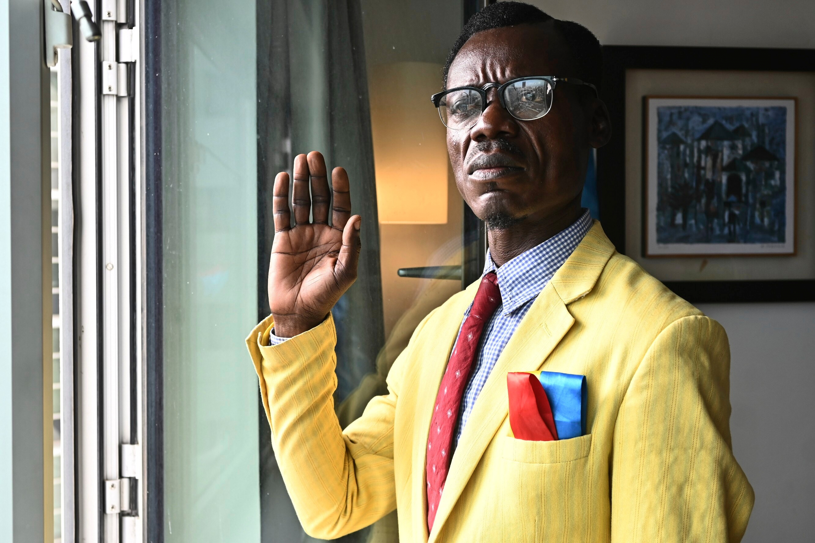 Statuesque Congo fan 'Lumumba' stands above all others at Africa Cup ...