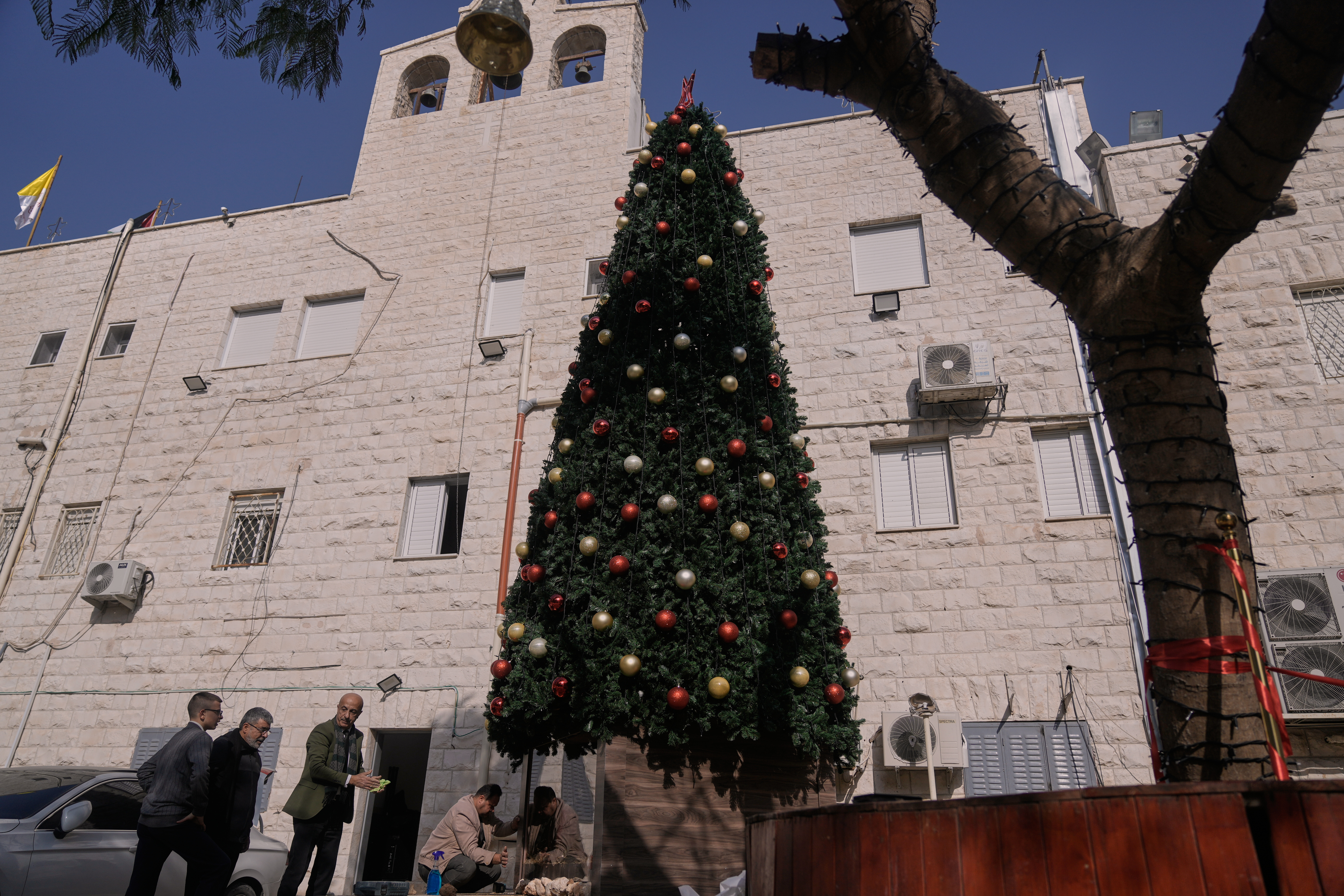 3 Palestinians arrested on suspicion of torching a Christmas tree at a ...