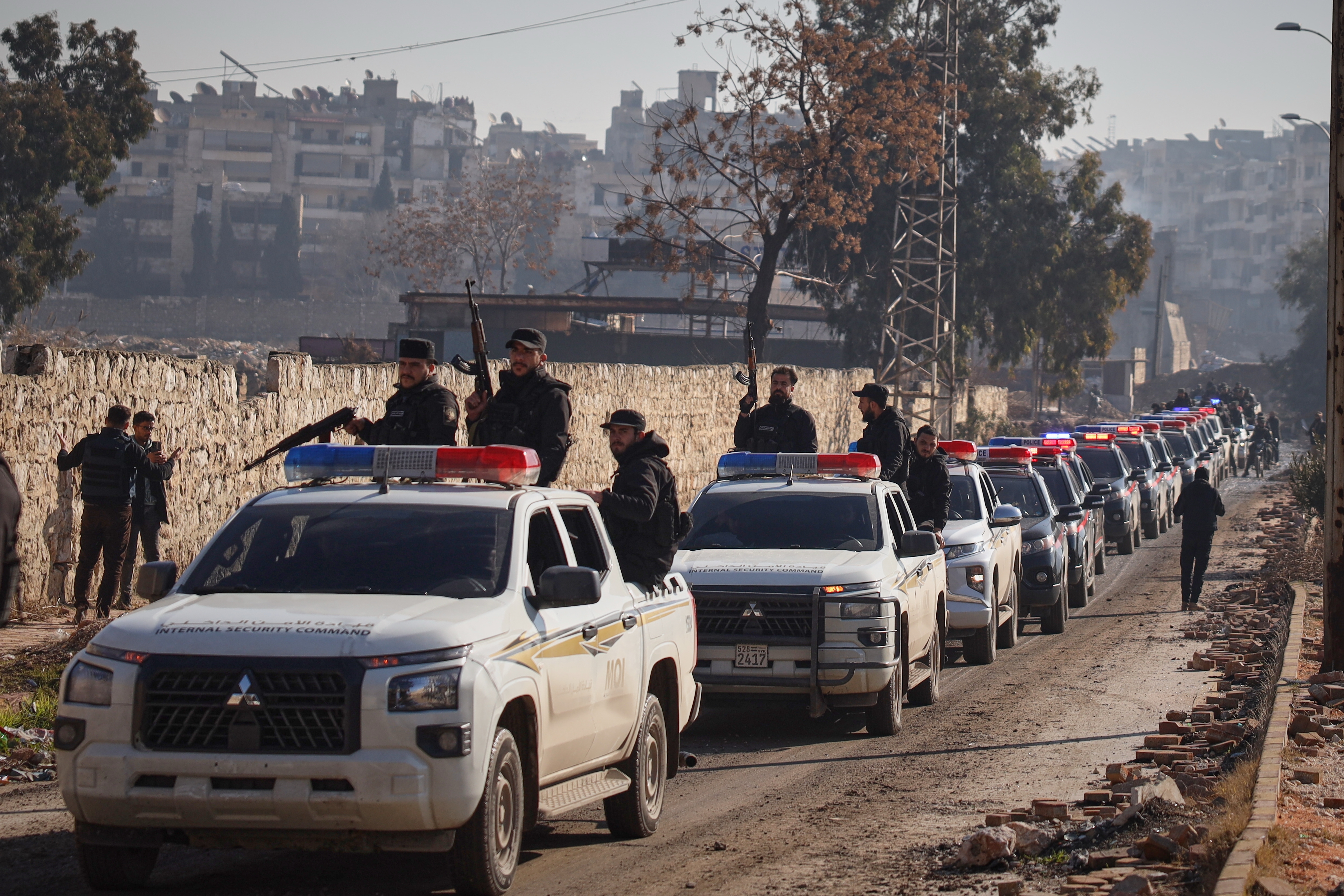 Syrian security forces enter Aleppo neighborhood after clashes with ...