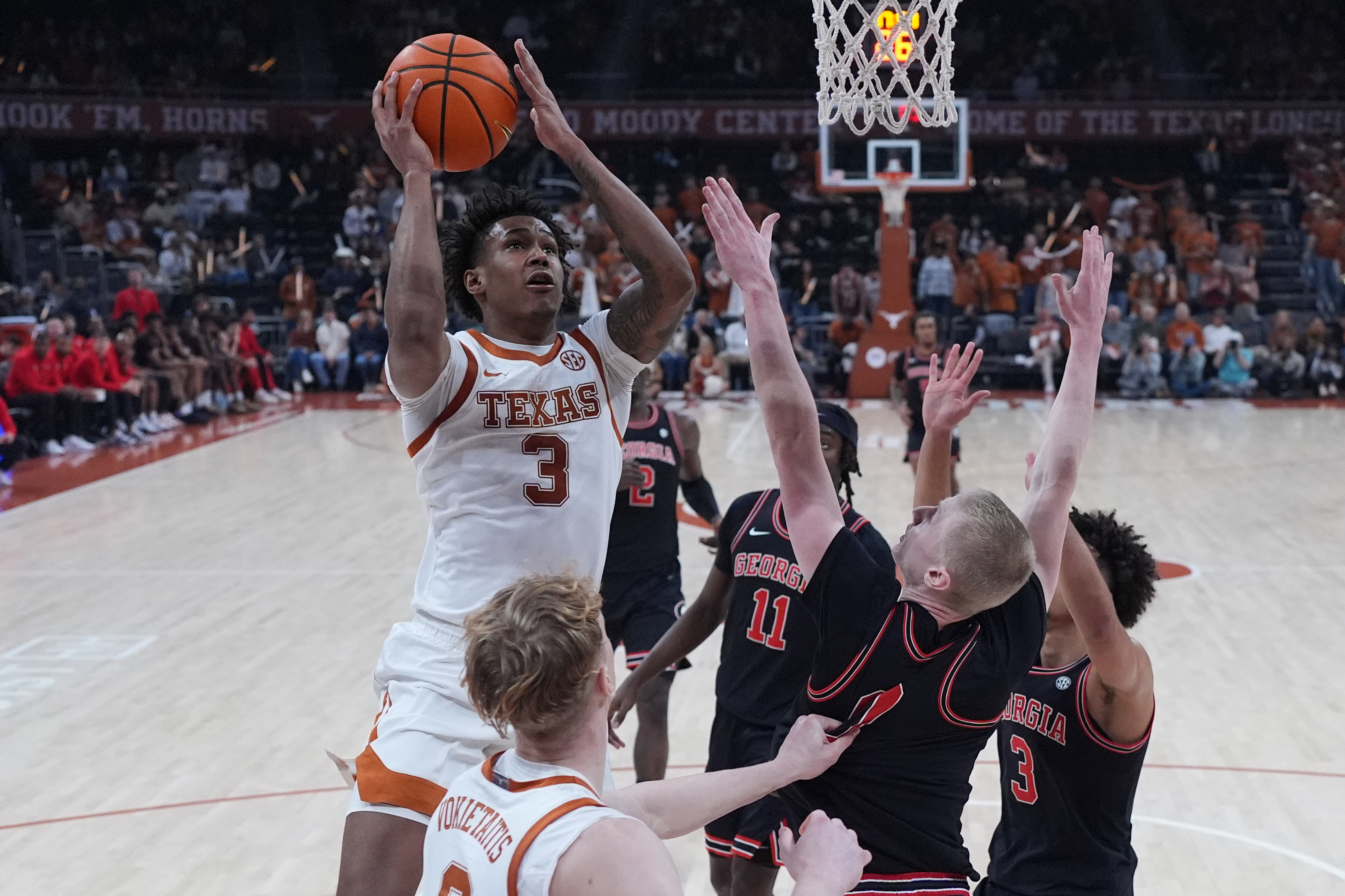 Texas rallies to beat No. 21 Georgia 87-67 behind Swain's 26 points ...