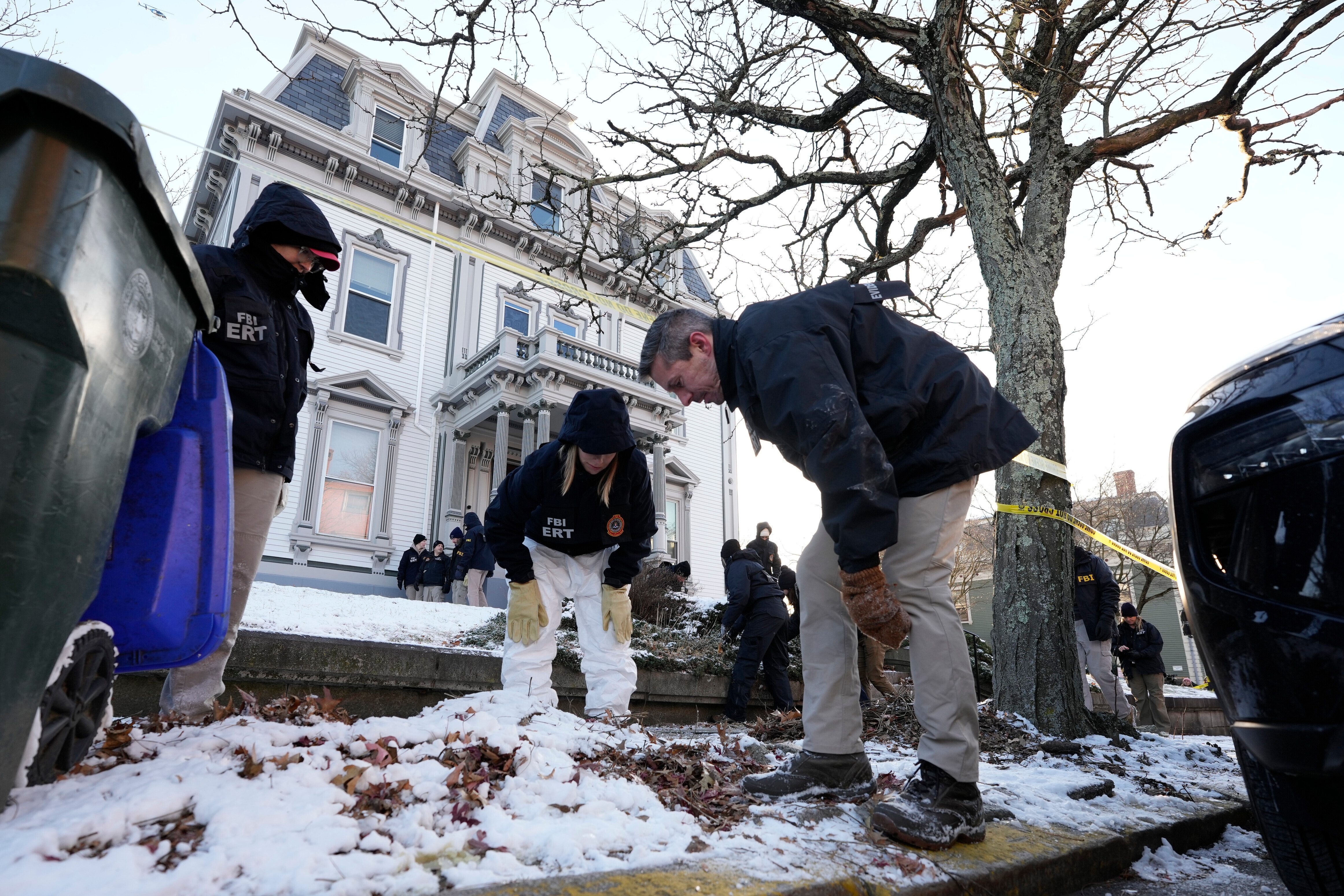 Search for the Brown University shooter continues as questions swirl ...