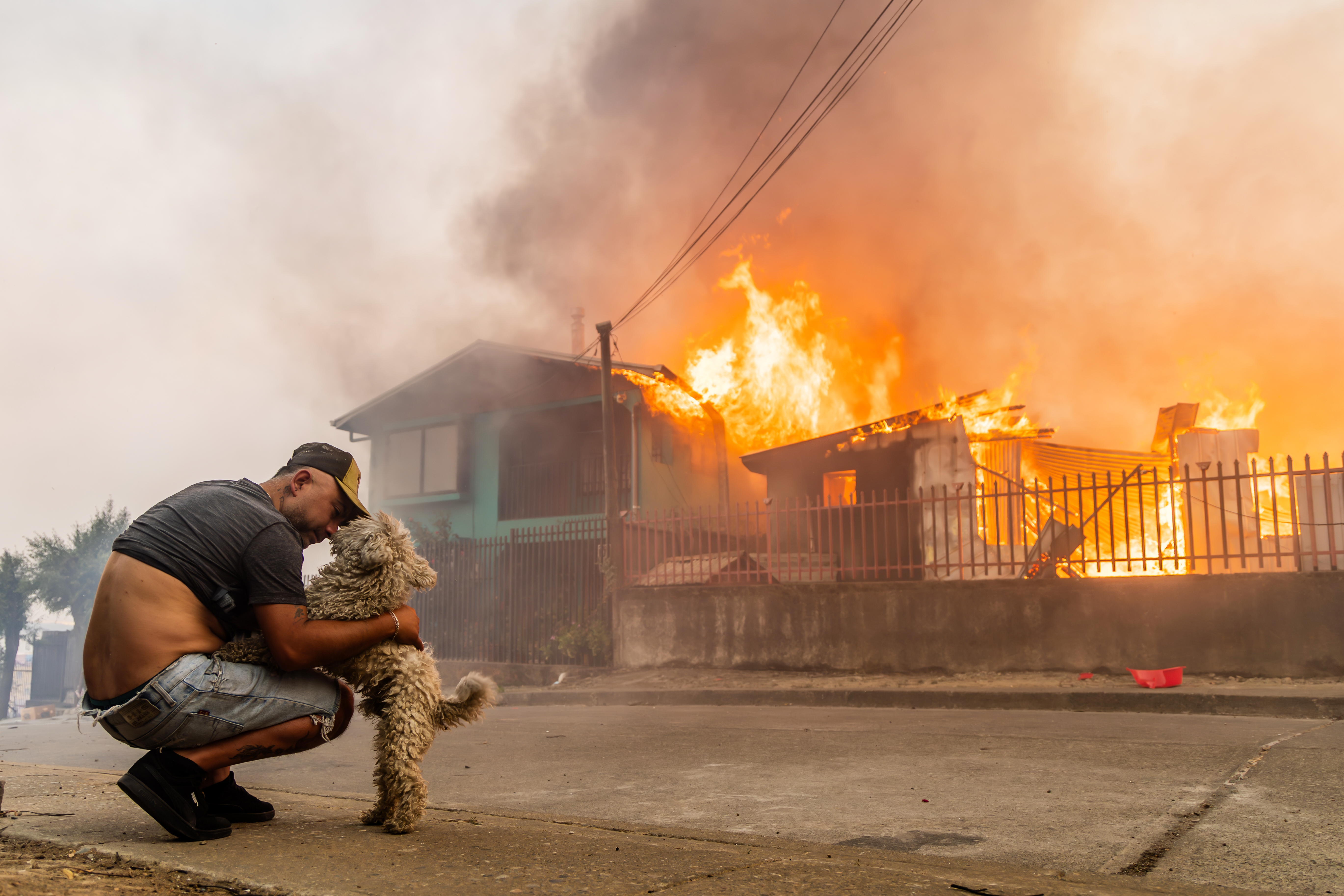 Wildfires race across Chile, leaving 15 dead and forcing thousands to ...
