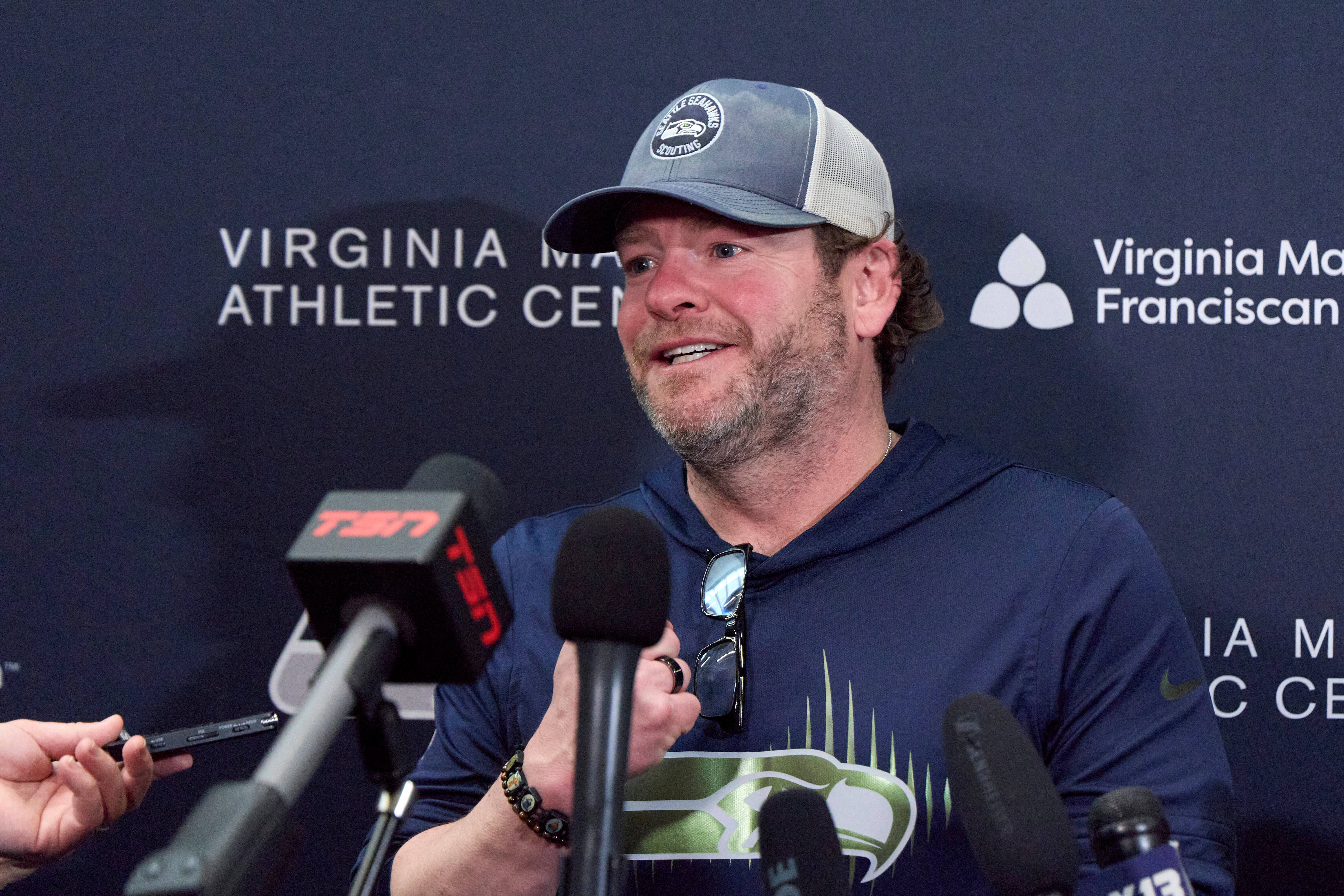 Shrewd moves in free agency and NFL draft helped GM John Schneider ...