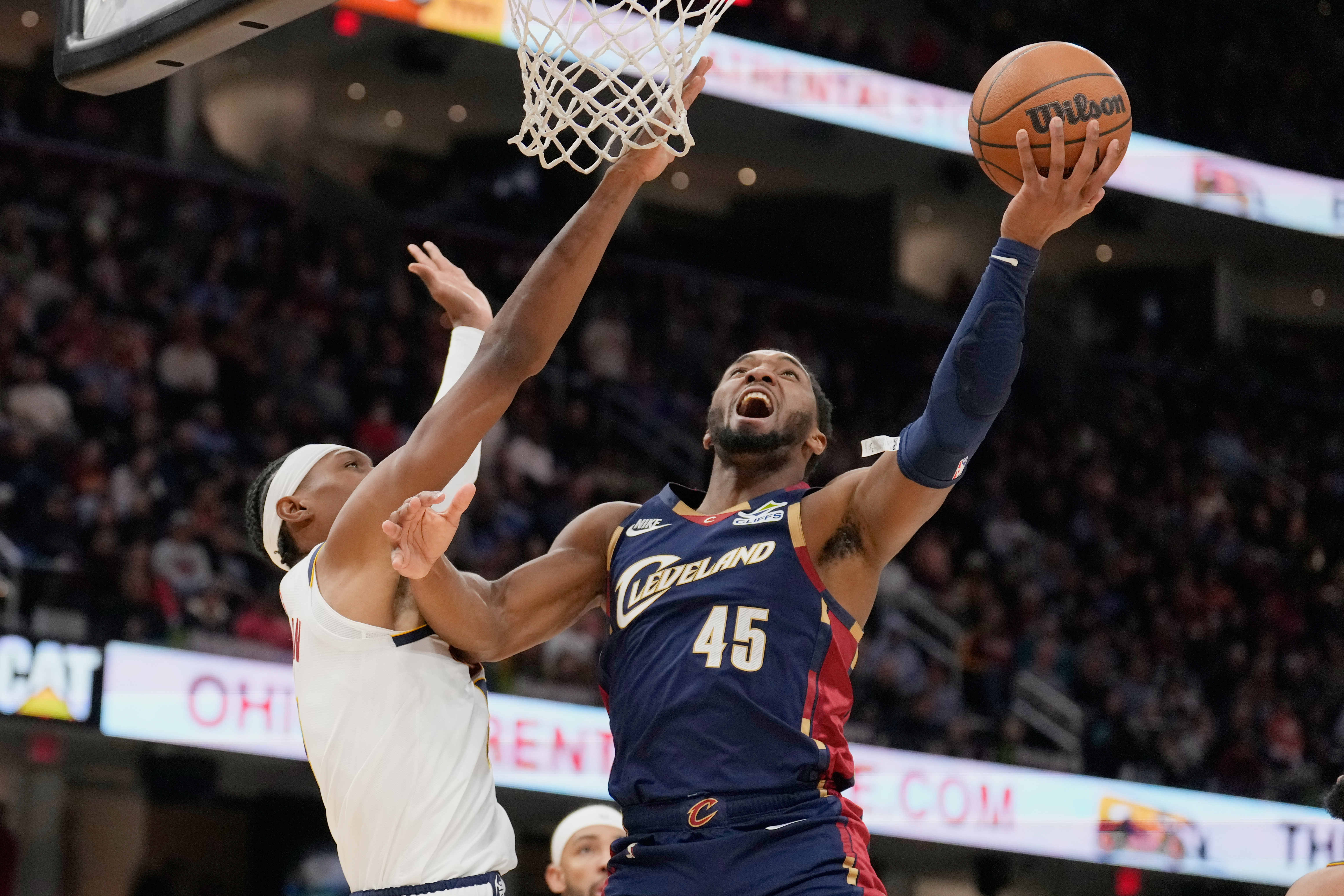 Mitchell's 33 points propel Cavaliers past short-handed Nuggets | 9news.com