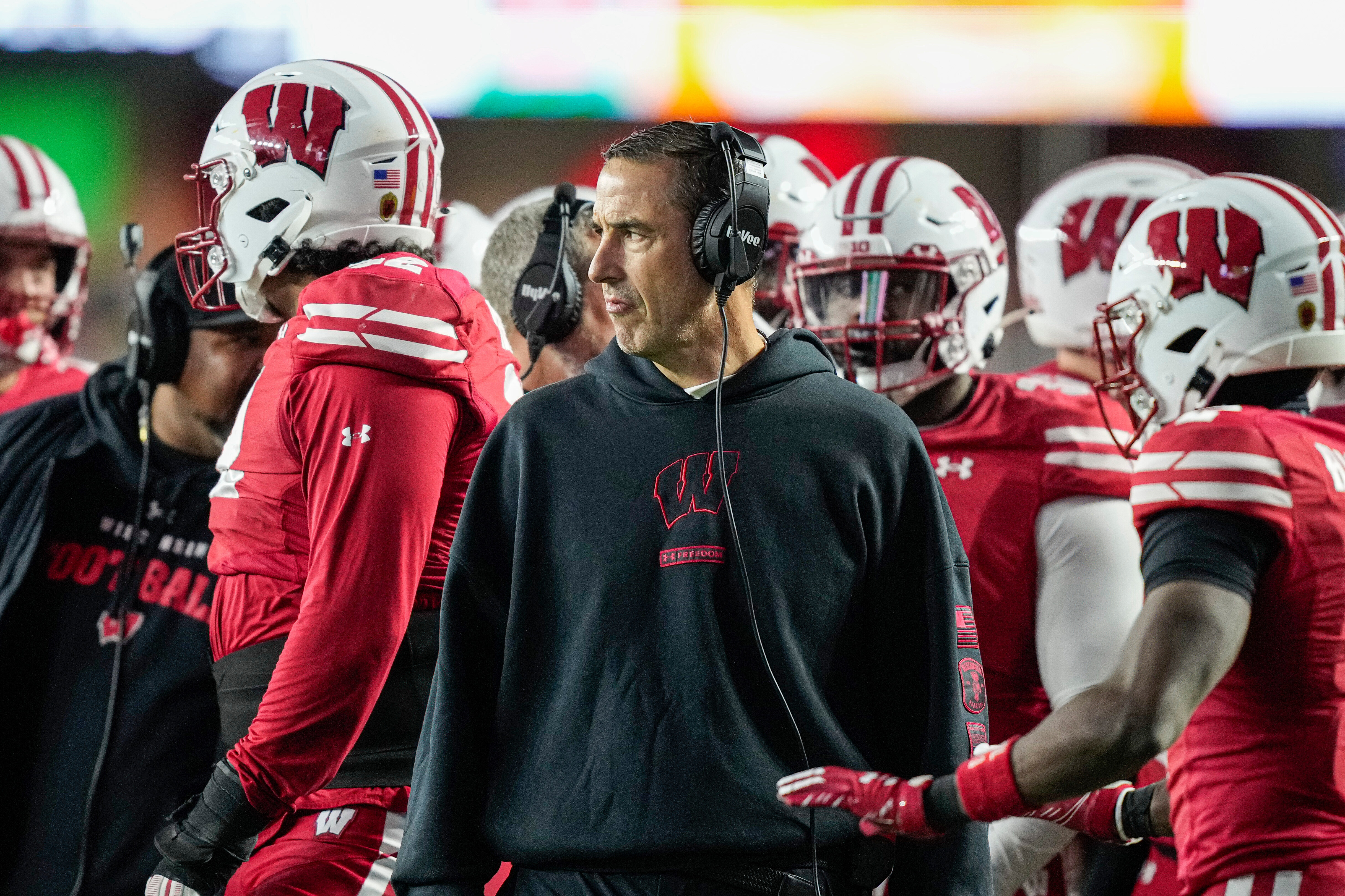 Wisconsin hires Eric Mateos as offensive line coach and doesn't renew ...