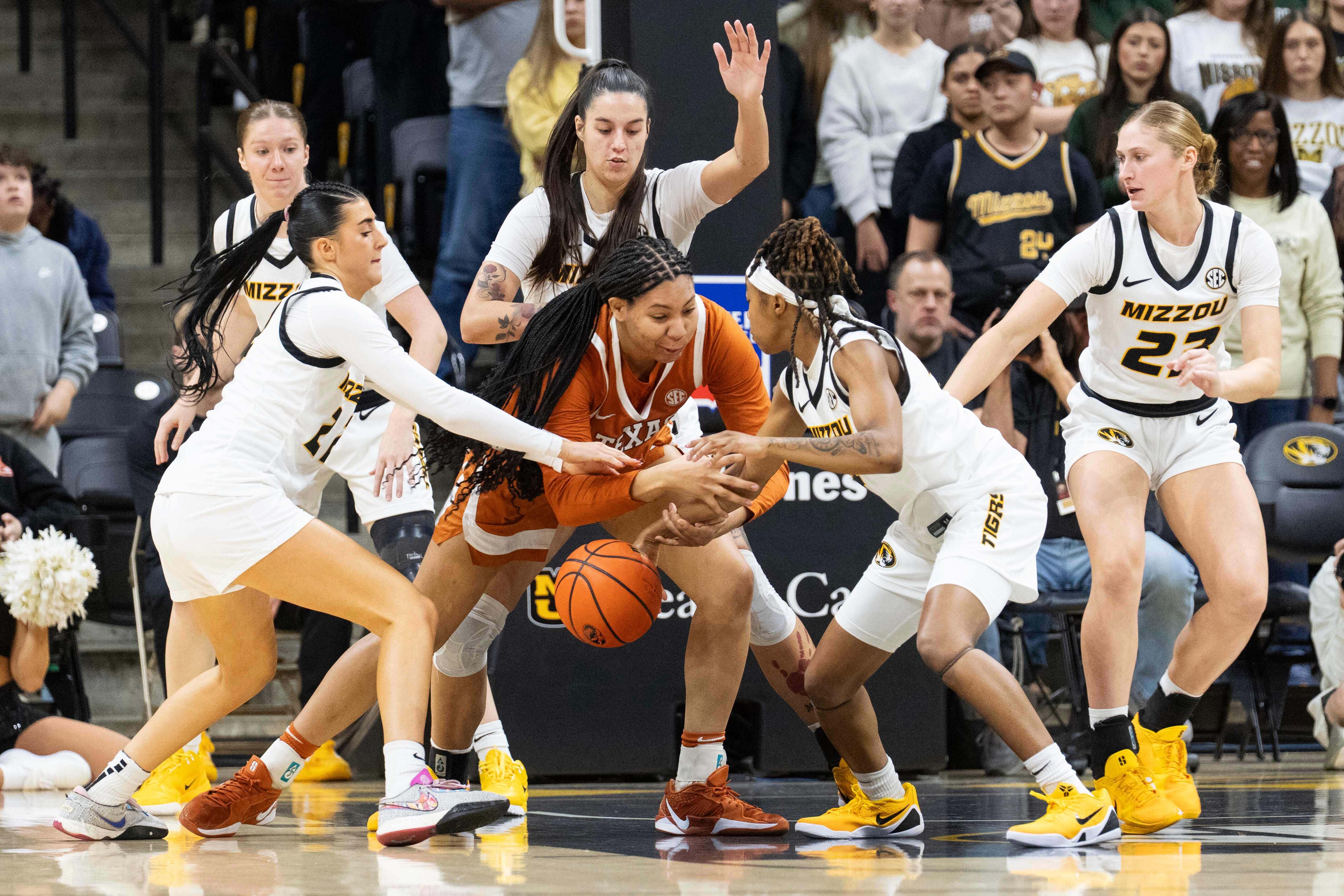 Madison Booker has 28 points and 10 rebounds to lead No. 2 Texas past Missouri 89-71 | kare11.com